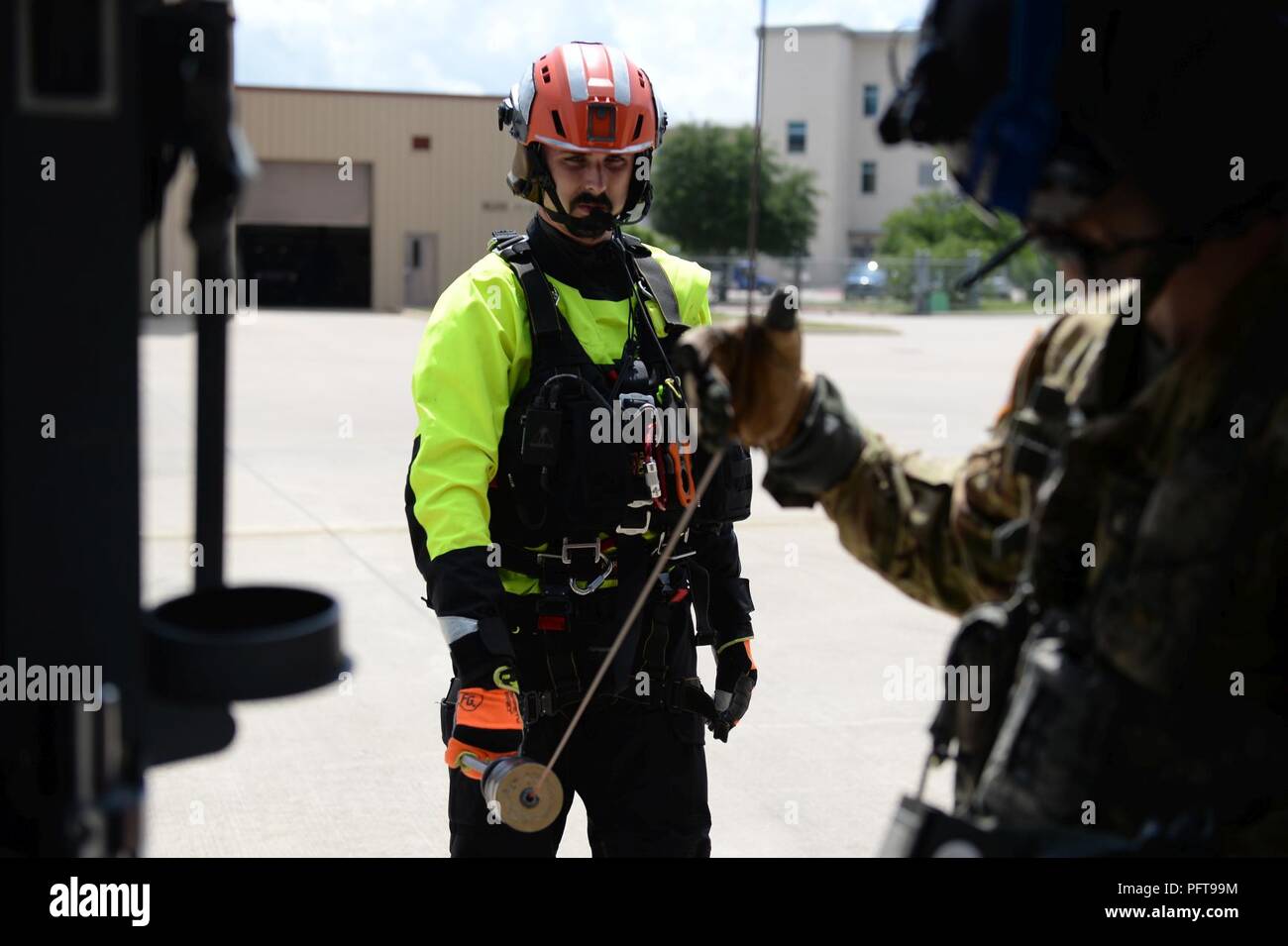 Soldiers from the Texas National Guard and rescue swimmers prepare for ...