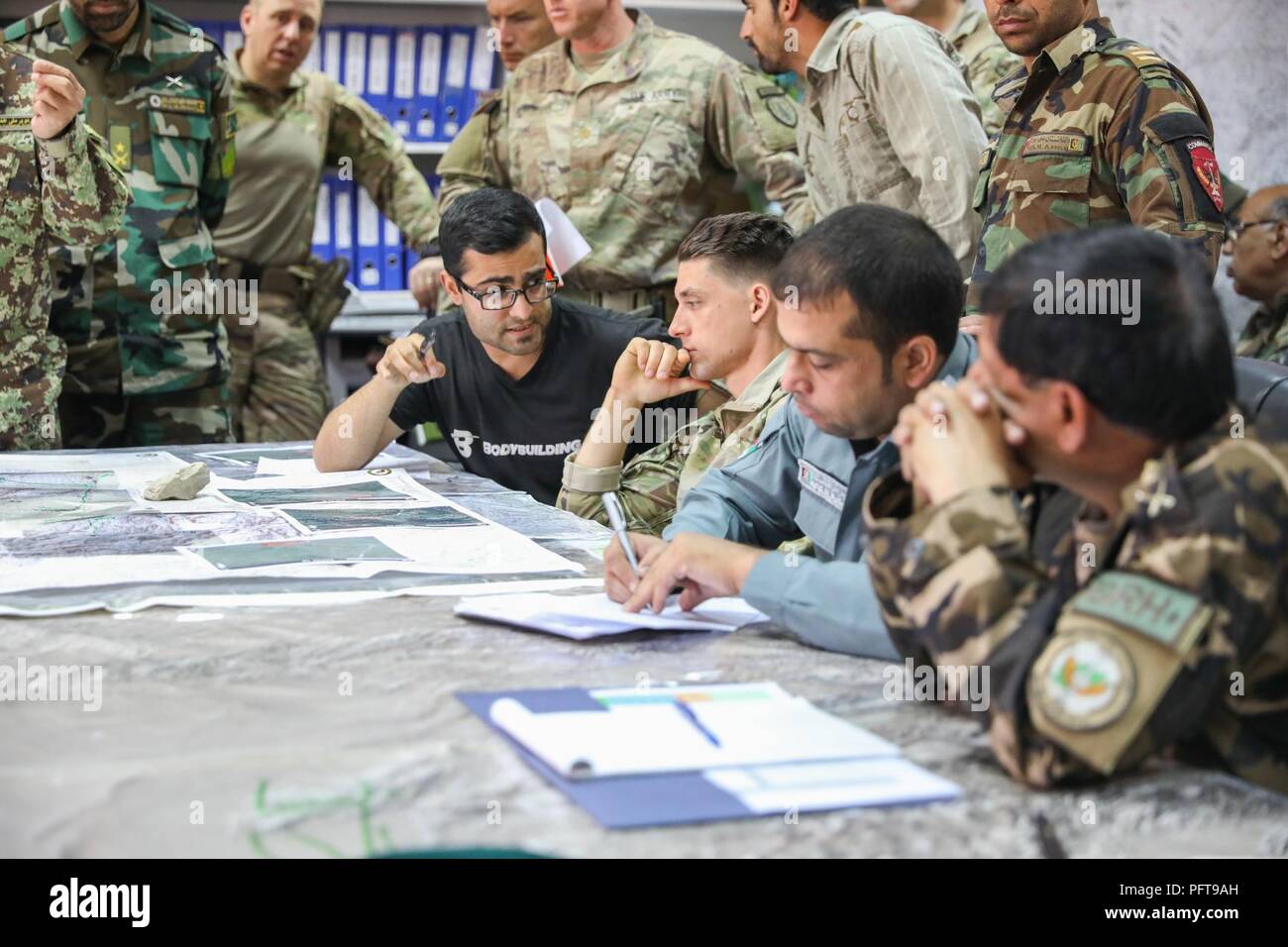 A translator, left, assigned to Train, Advise and Assist Command-South ...