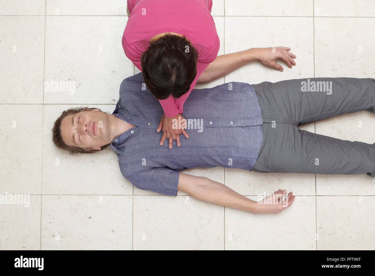 First aid treatment, chest compression, giving CPR Stock Photo - Alamy