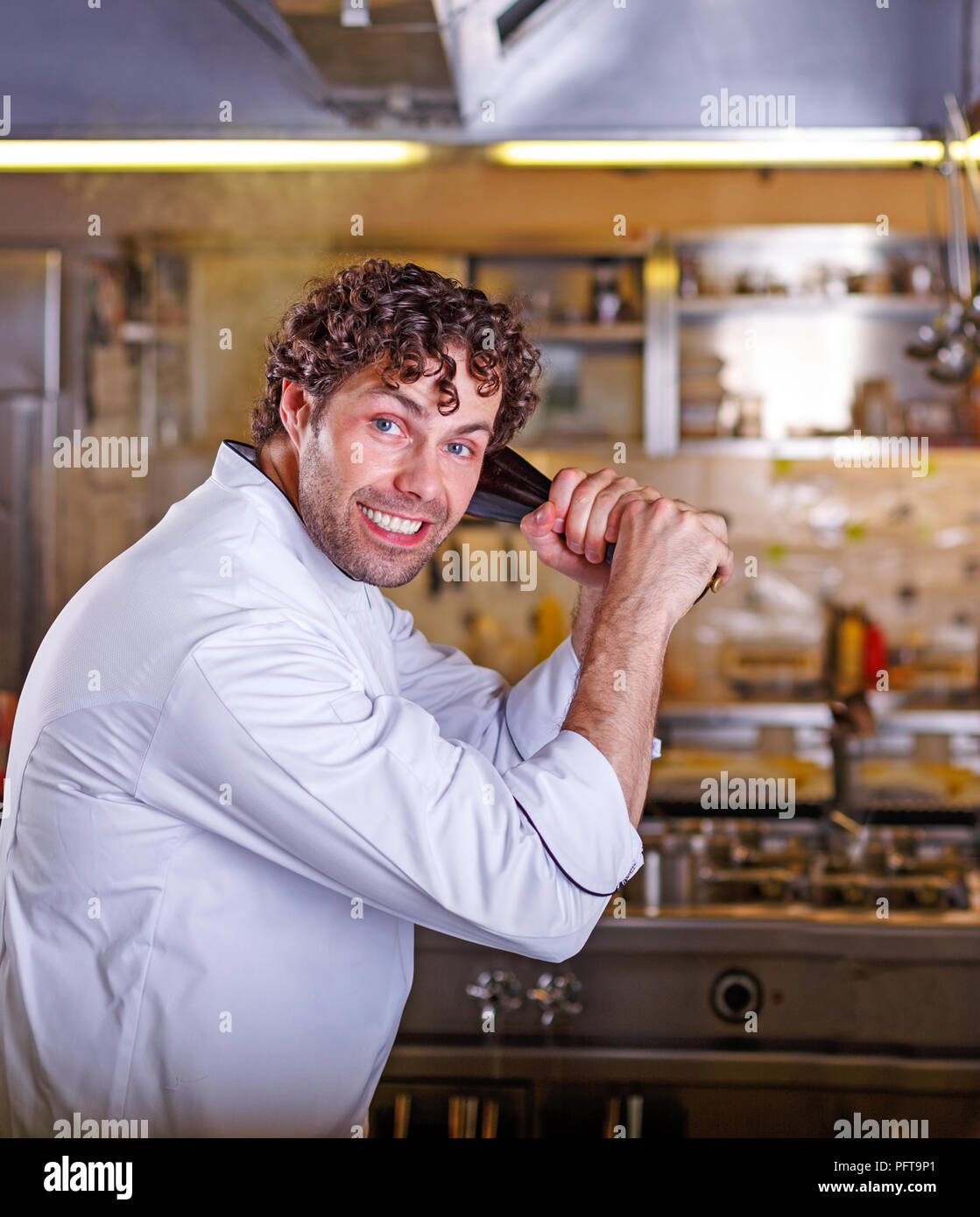 Chef fighting in the kitchen. Cooking process concept Stock Photo - Alamy