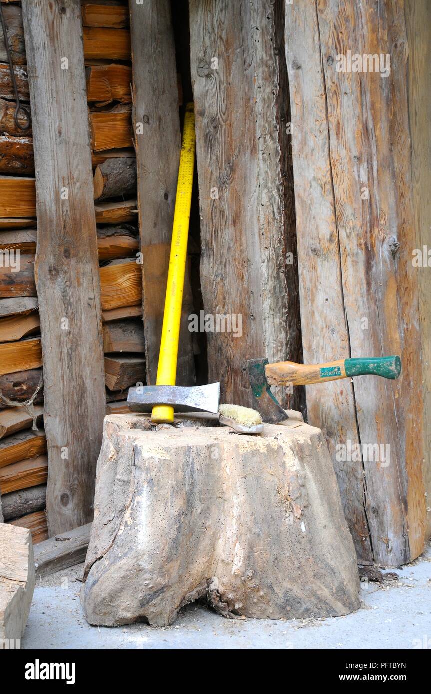 two axes on block Stock Photo - Alamy