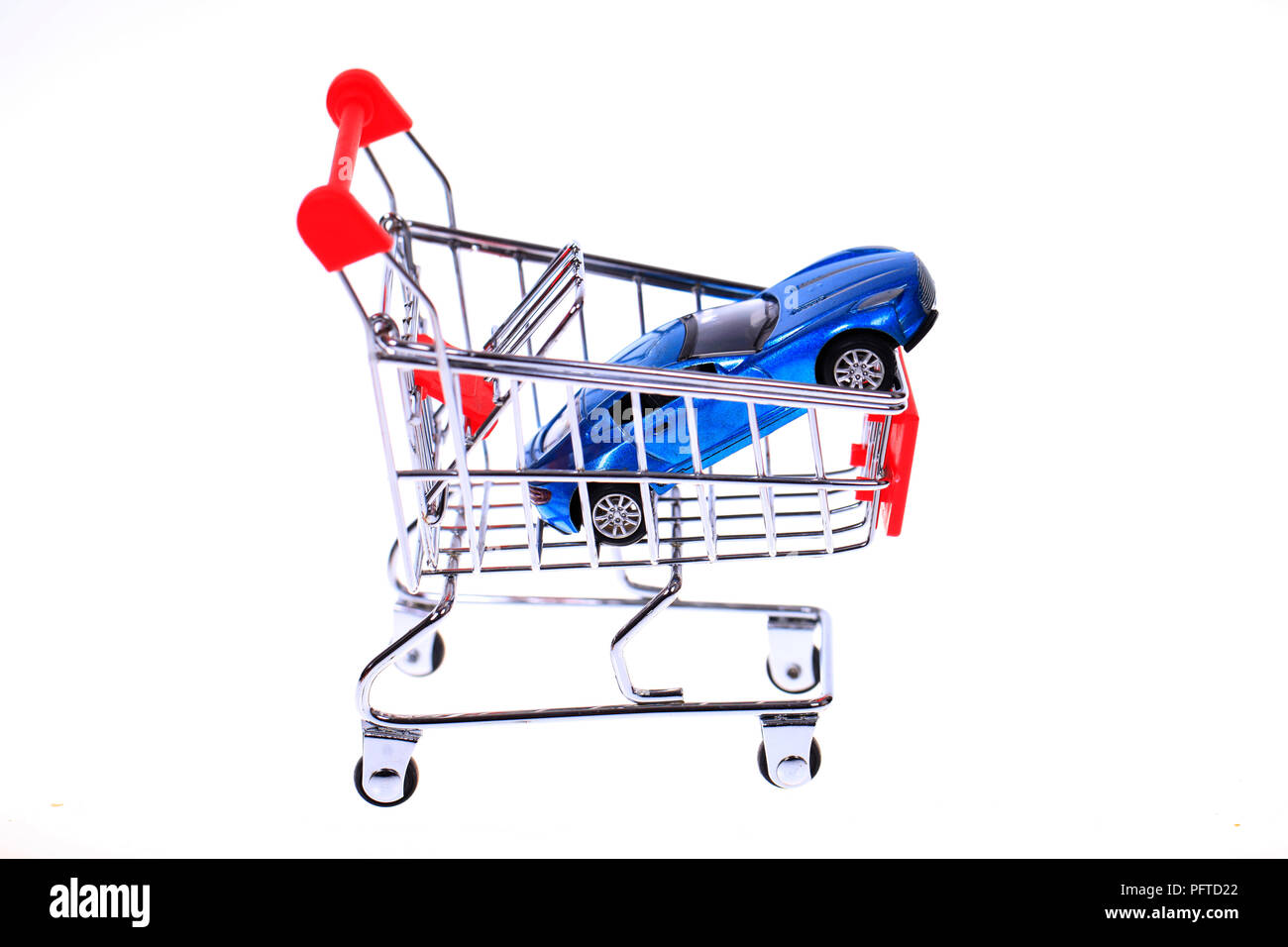 Car shopping, The car model in the shopping cart Stock Photo - Alamy