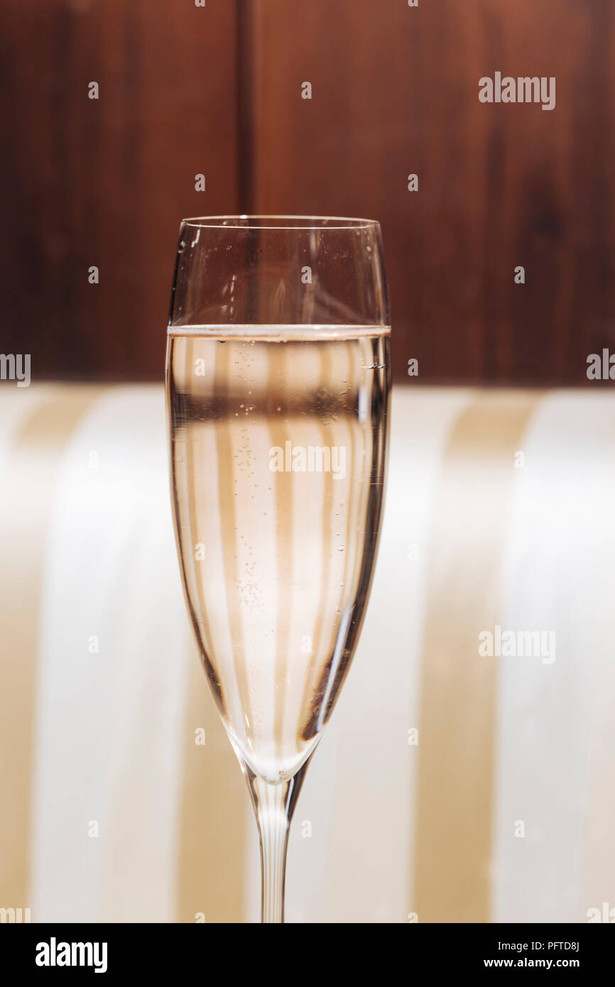 Prosecco glass in an elegant bar with vintage pop colors Stock Photo ...