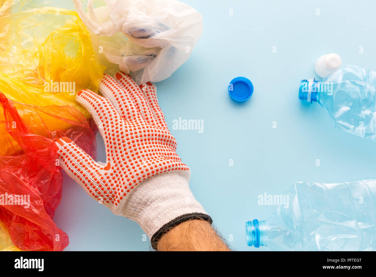 Worker sorting plastic garbage for recycling, conceptual image Stock ...