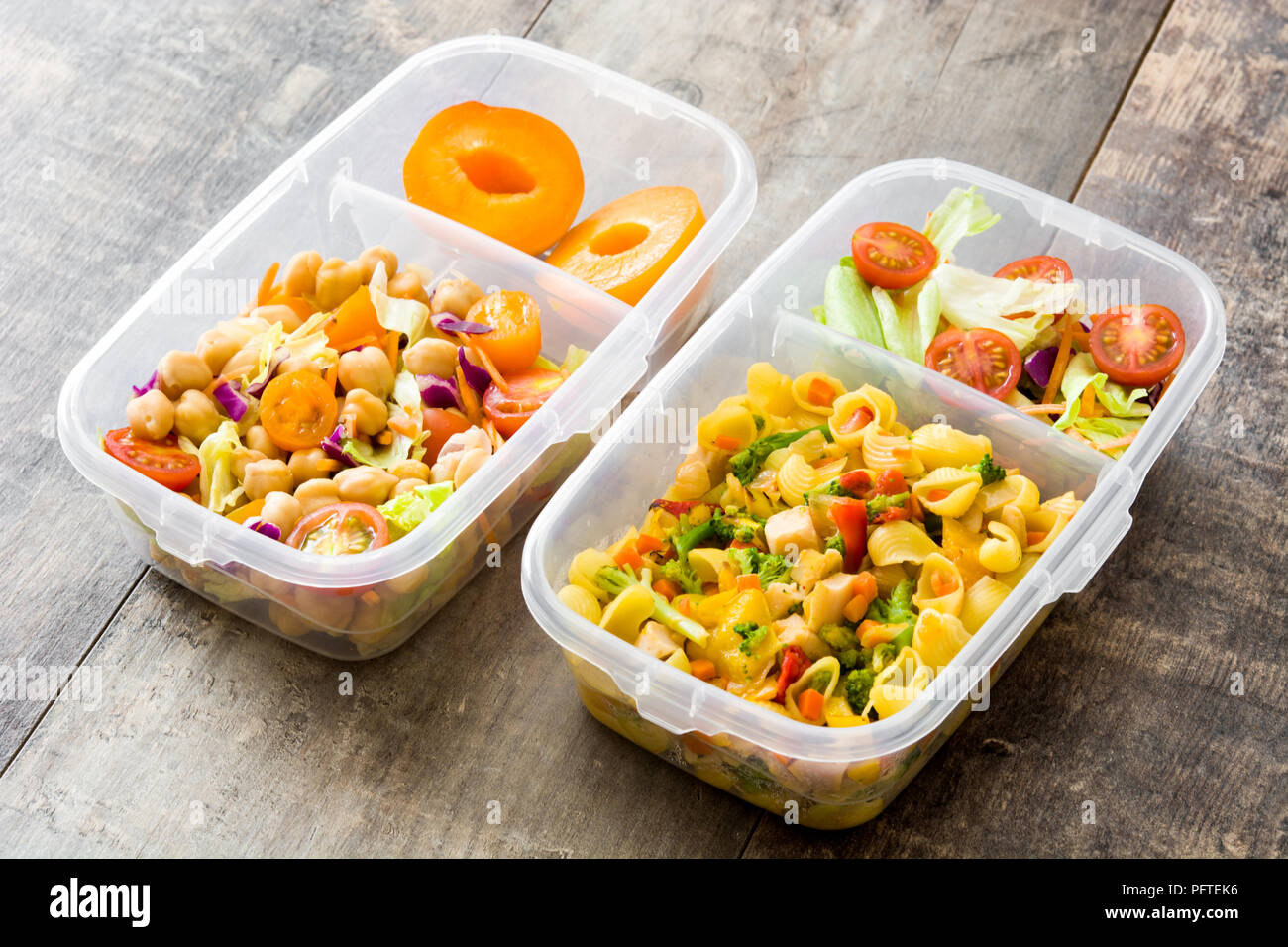 Lunch box with healthy food ready to eat on wooden table Stock Photo ...