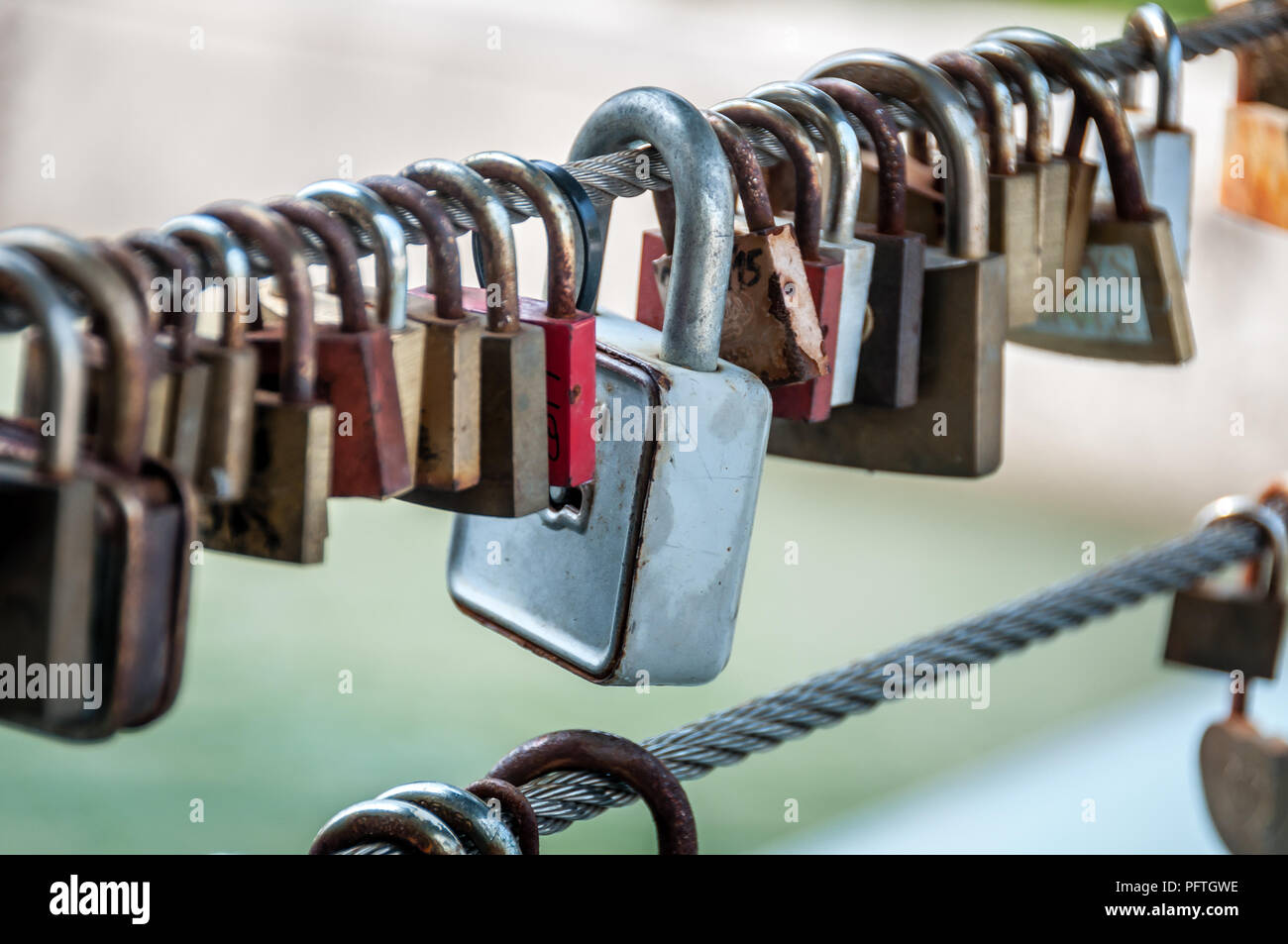 Locks on the bridge in a row Stock Photo - Alamy