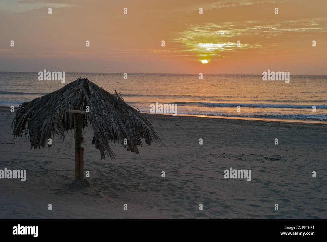 Sundown on the Beach with Umbrella, Vichayito Beach, Peru Stock Photo ...