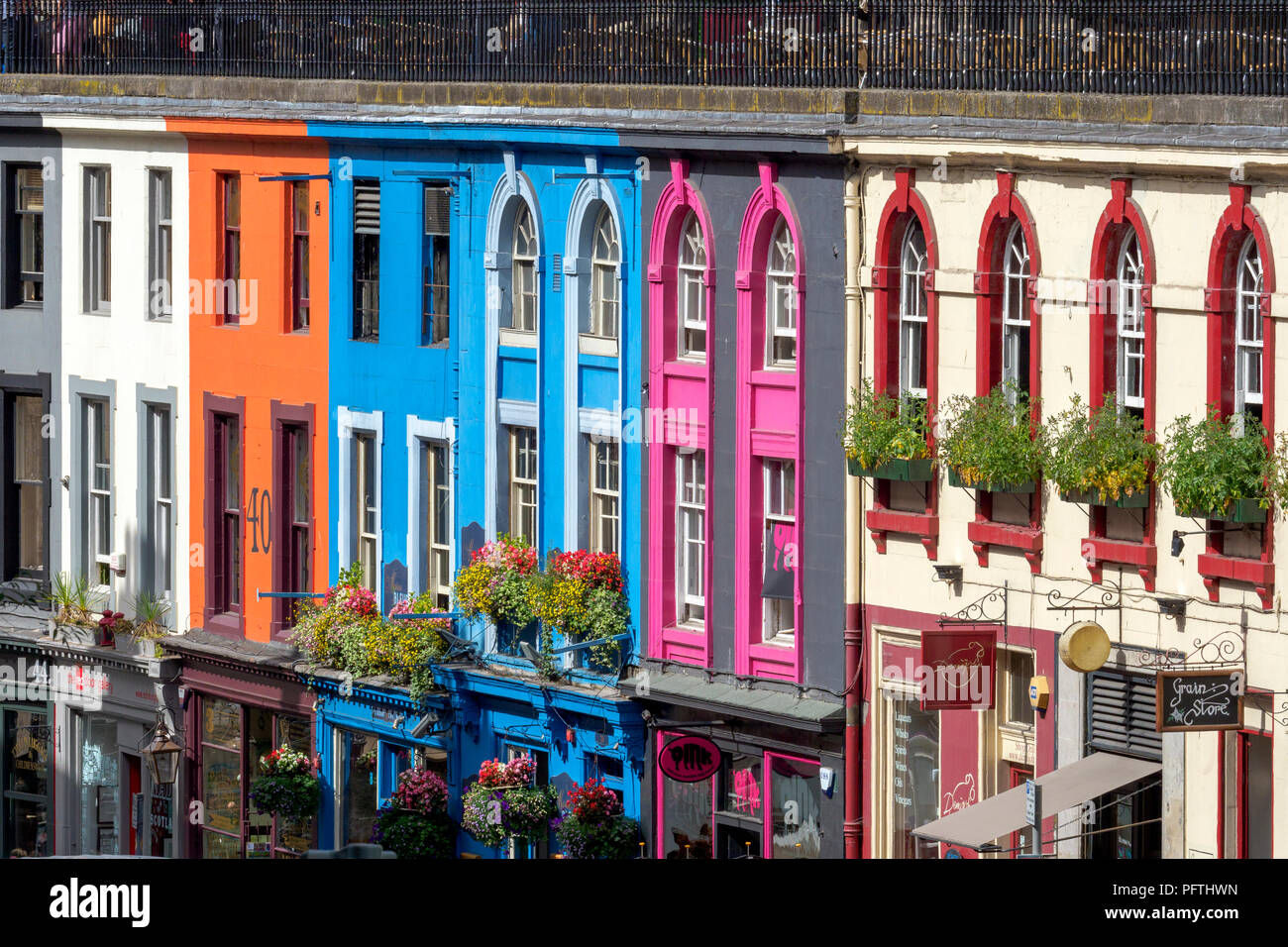 Colourful shop fronts on Victoria Terrace, Edinburgh, during the ...