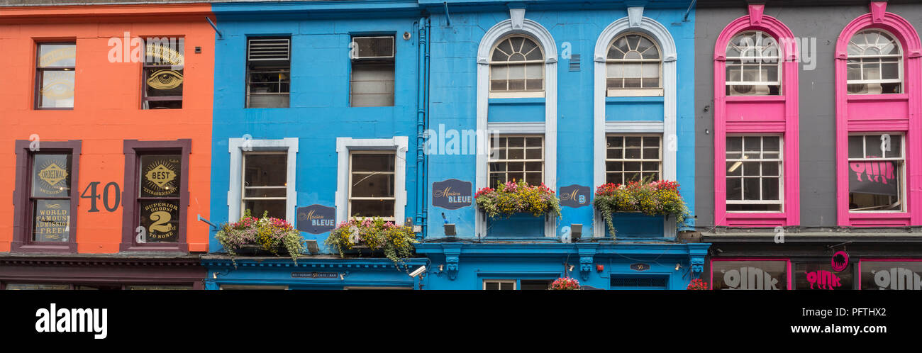 Colourful shop fronts on Victoria Terrace, Edinburgh, during the ...