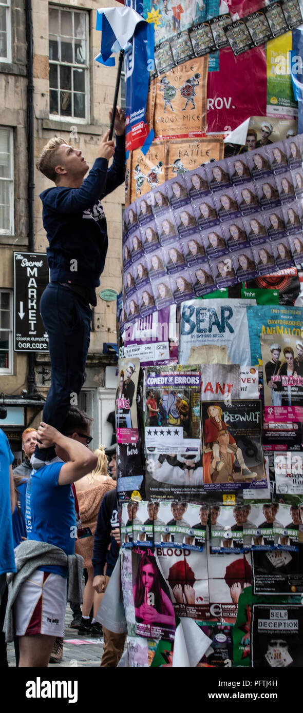 Putting Up Posters High Resolution Stock Photography and Images - Alamy