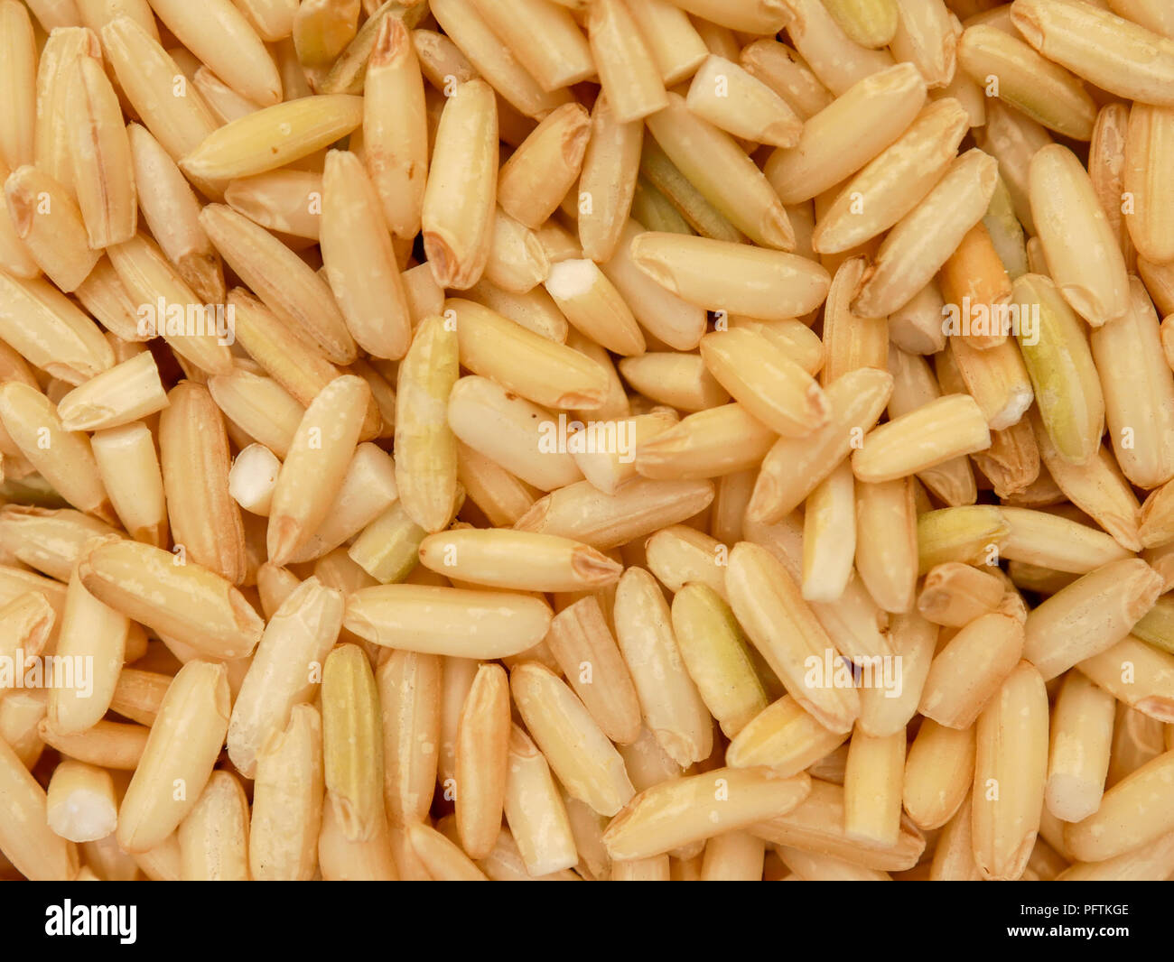 Raw brown rice. top view food background texture Stock Photo - Alamy