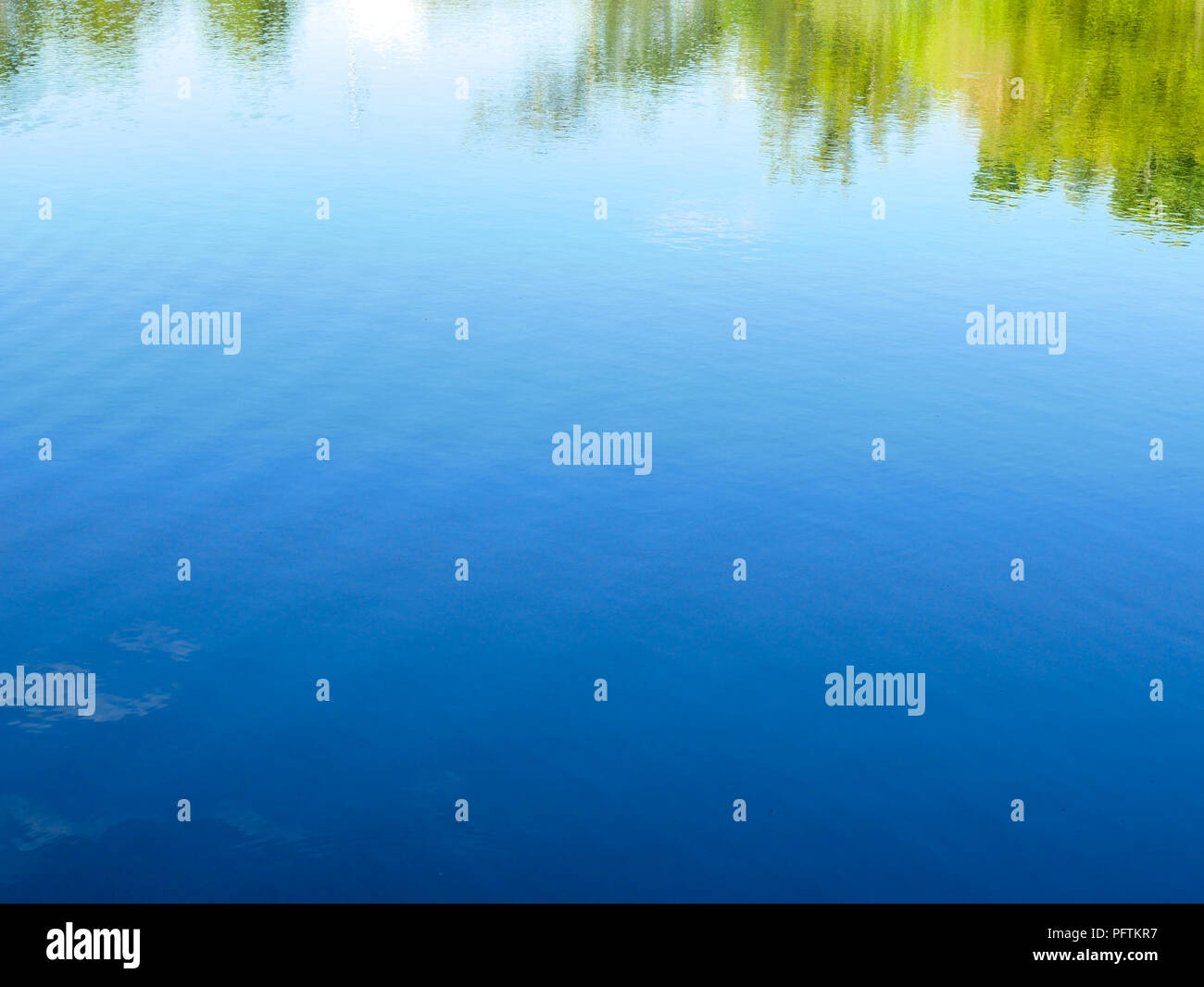 Abstract water reflection texture background Stock Photo - Alamy