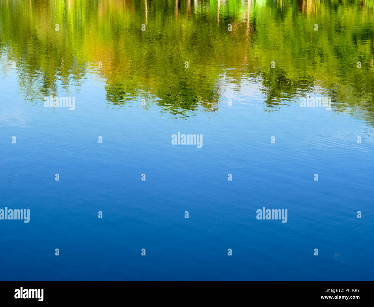 Abstract water reflection texture background Stock Photo - Alamy