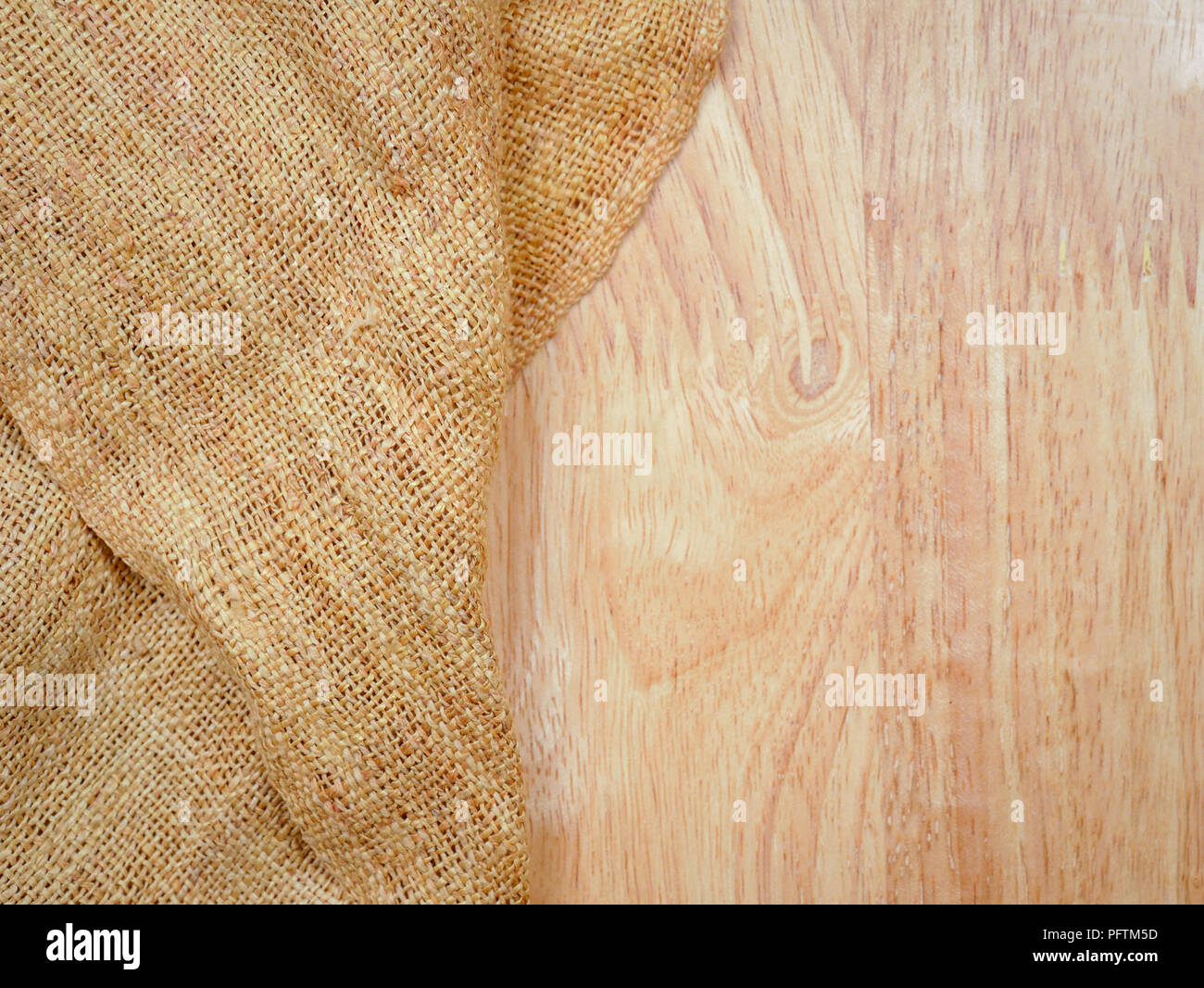 texture background Wood table with old sackcloth burlap tablecloth ...
