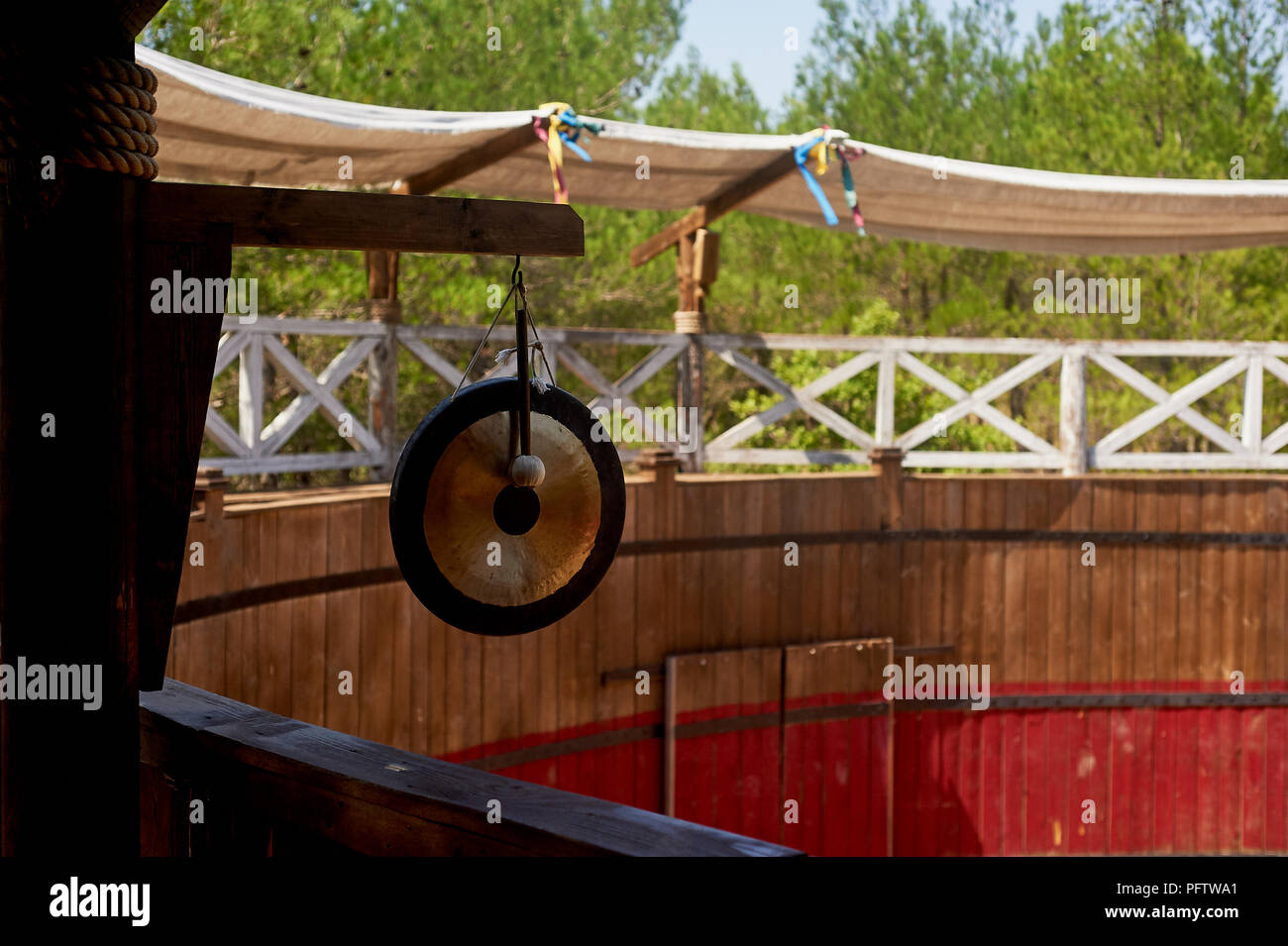 Gong. Symbol of the beginning of the day or battle. Golden Stock Photo ...