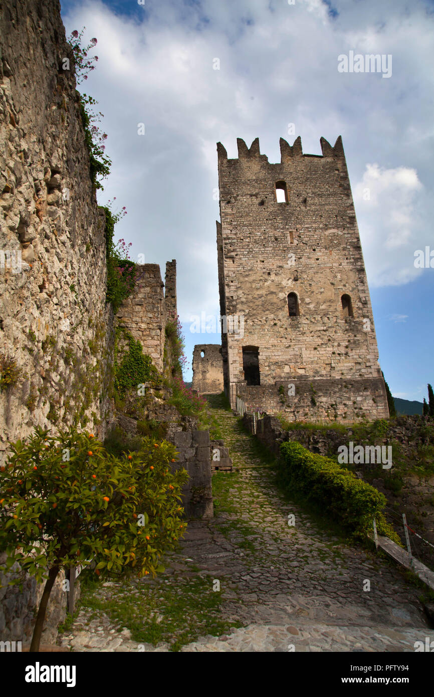 Rock walls of medieval castle in Arco of Trento near the Garda Lake in ...