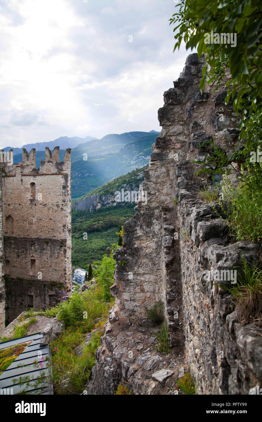 Rock walls of medieval castle in Arco of Trento near the Garda Lake in ...