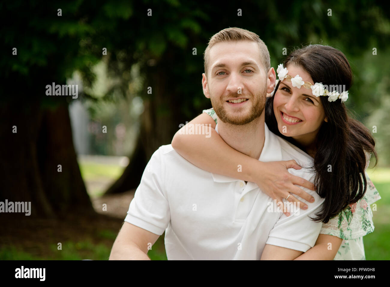 Young couple showing affection Stock Photo - Alamy