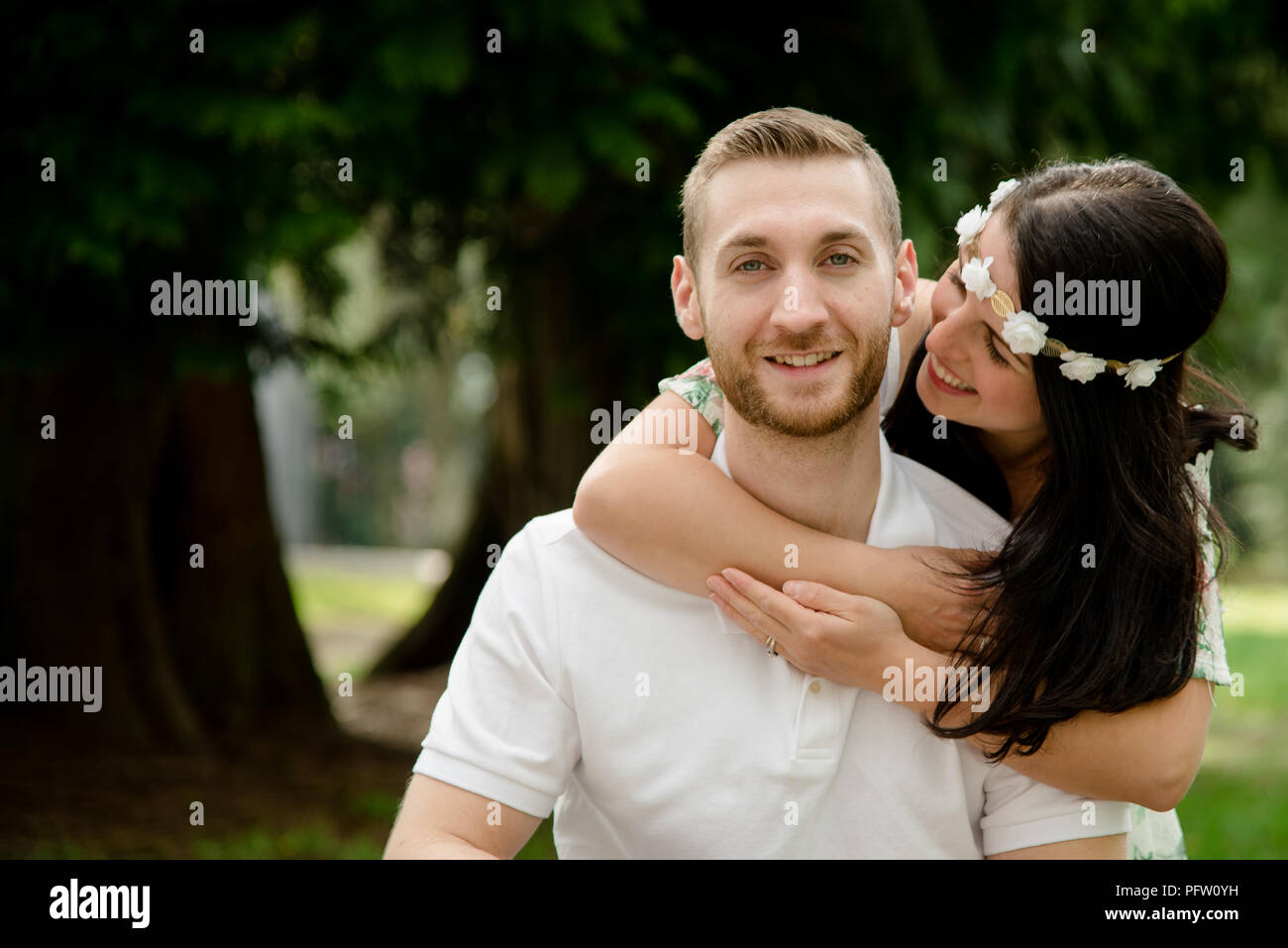 Young couple showing affection Stock Photo - Alamy