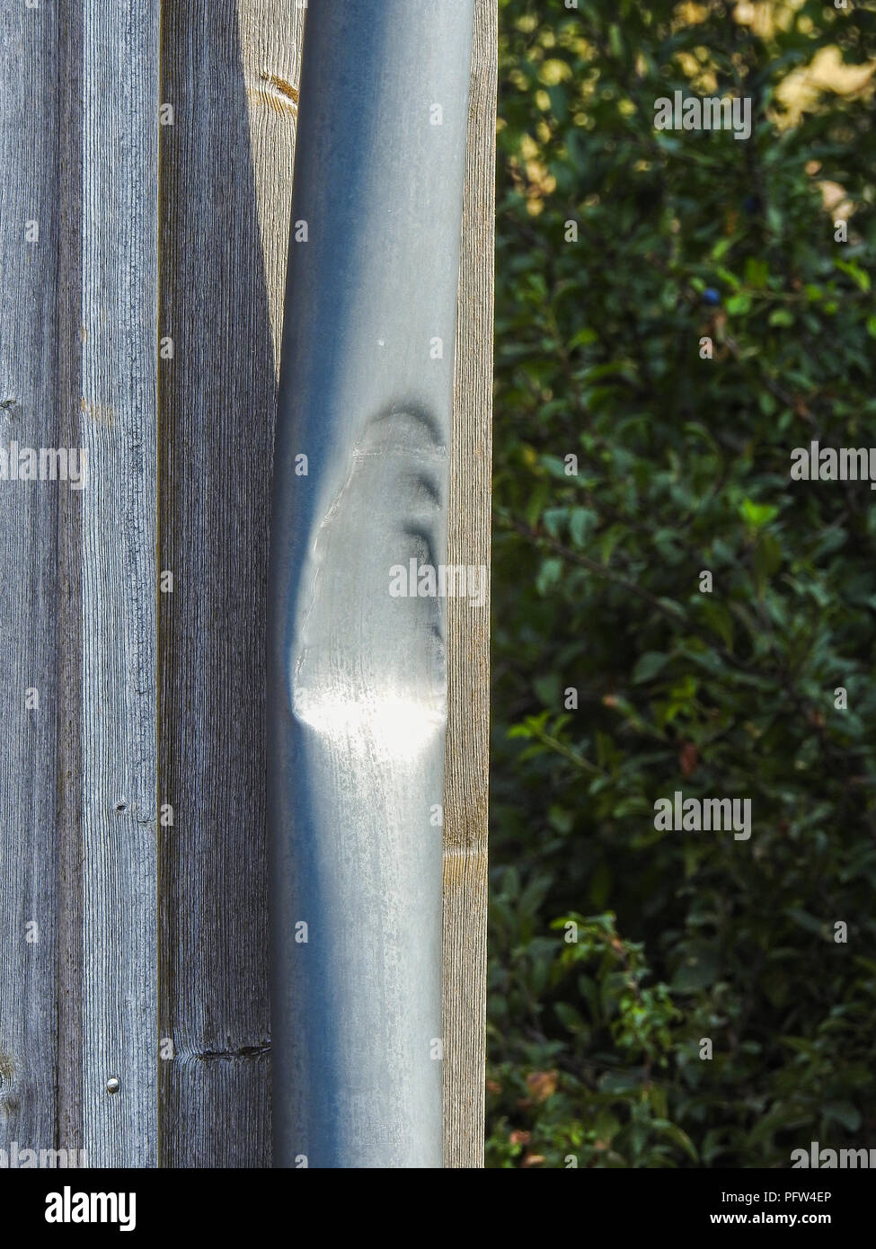 Dented Metal Pole