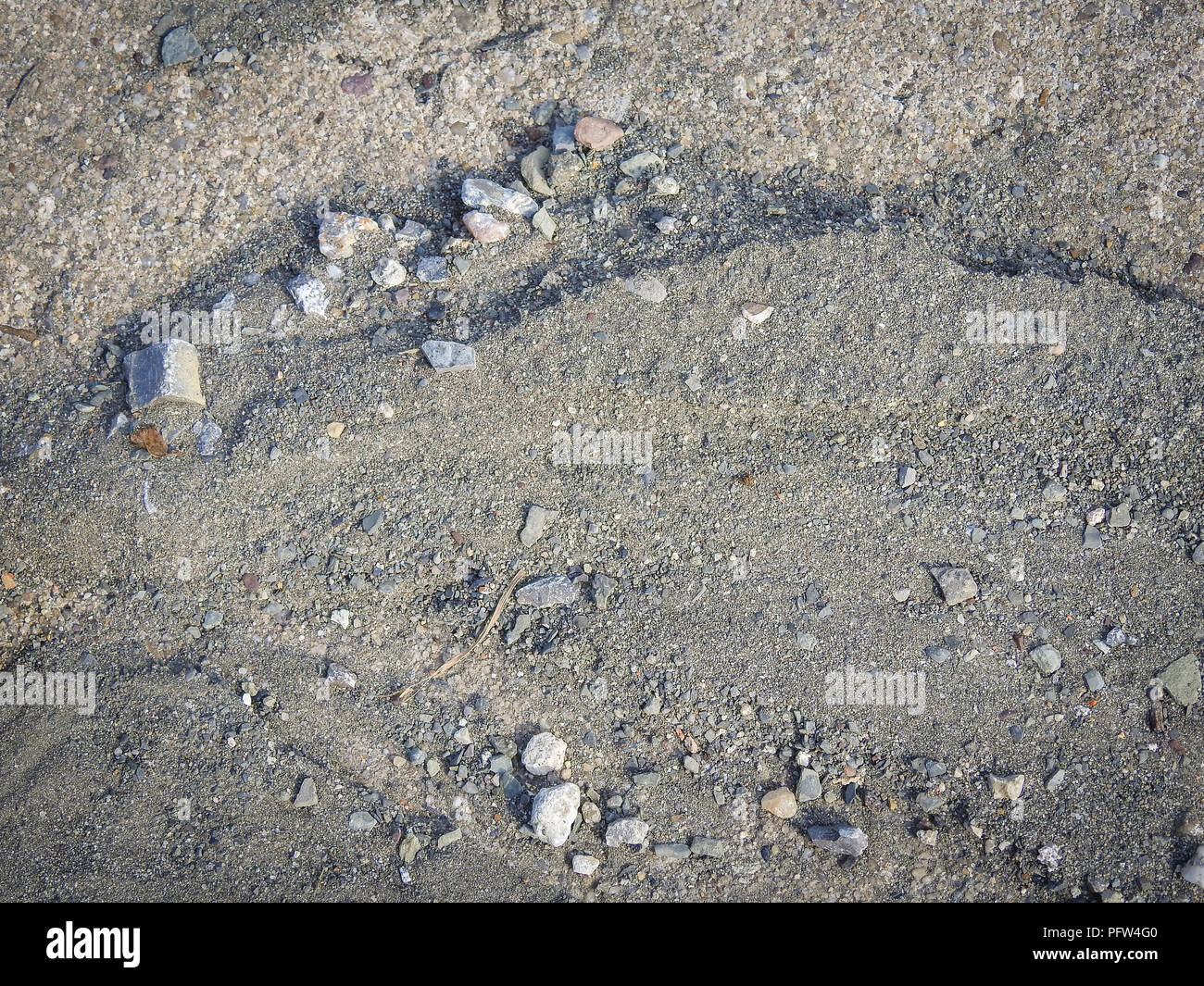 Pebblestones at the dirt road background Stock Photo - Alamy