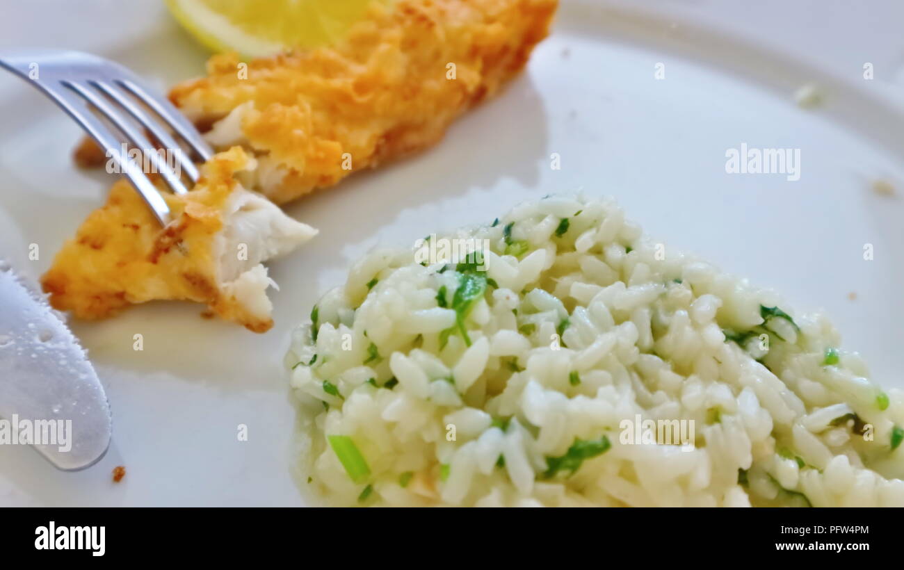 Grouper fillet with cilantro rice hi-res stock photography and images ...