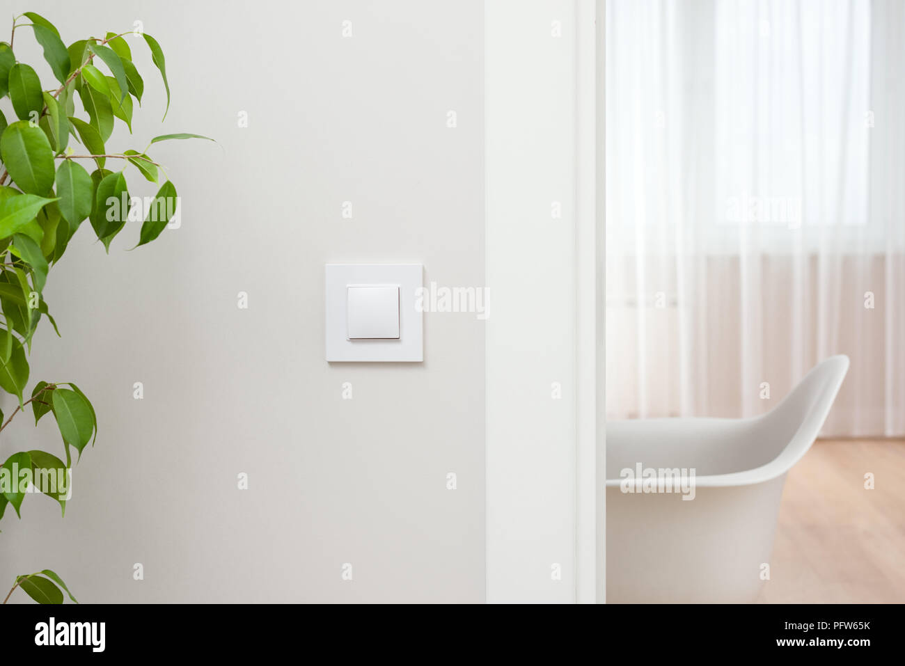 Close-up elements of the interior of the apartment. The light switch on ...