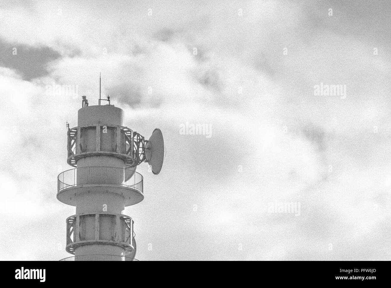 Signal tower with cloud sky Stock Photo - Alamy