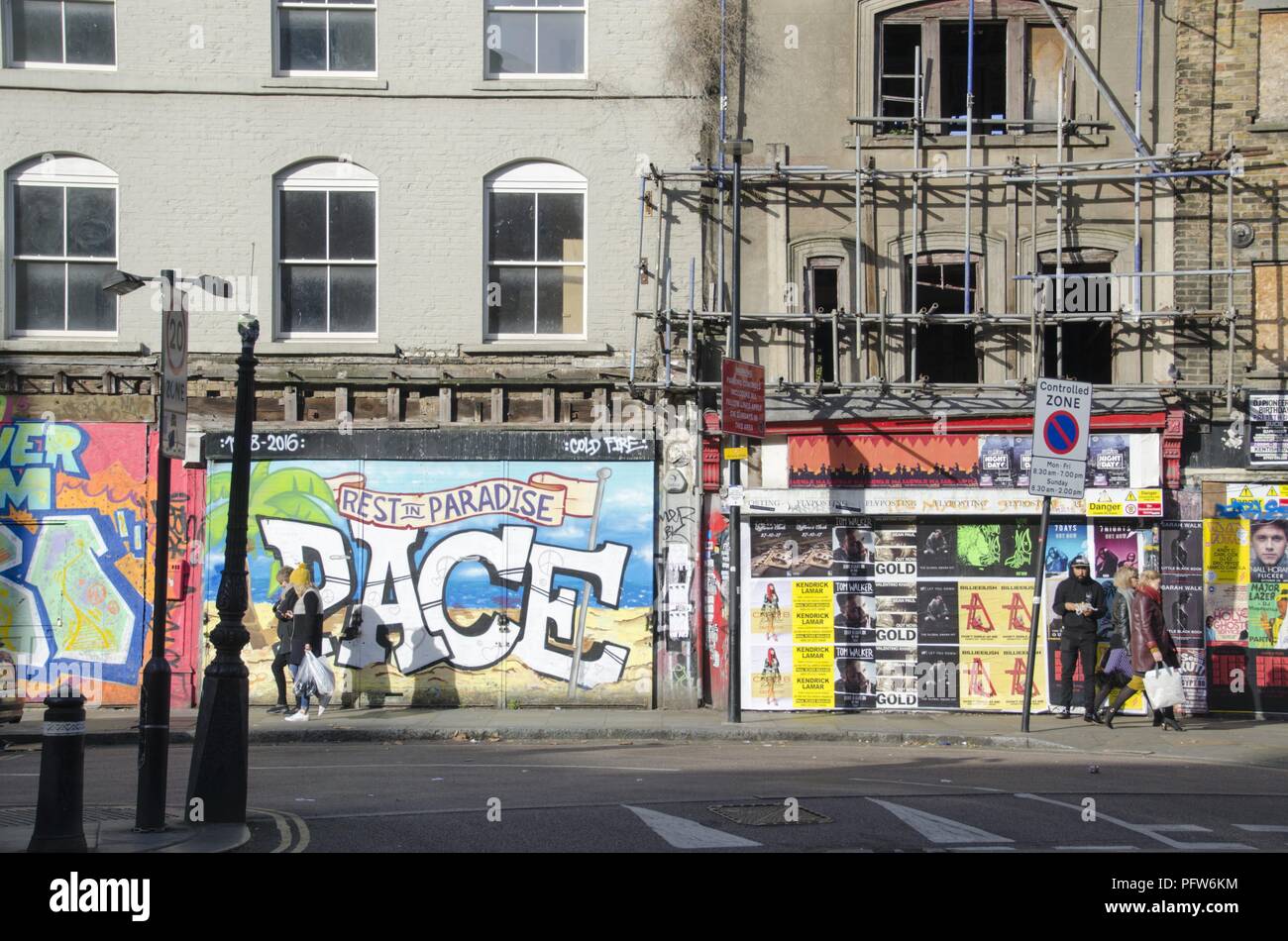 Murals on old buildings at the Shoreditch entertainment district at ...