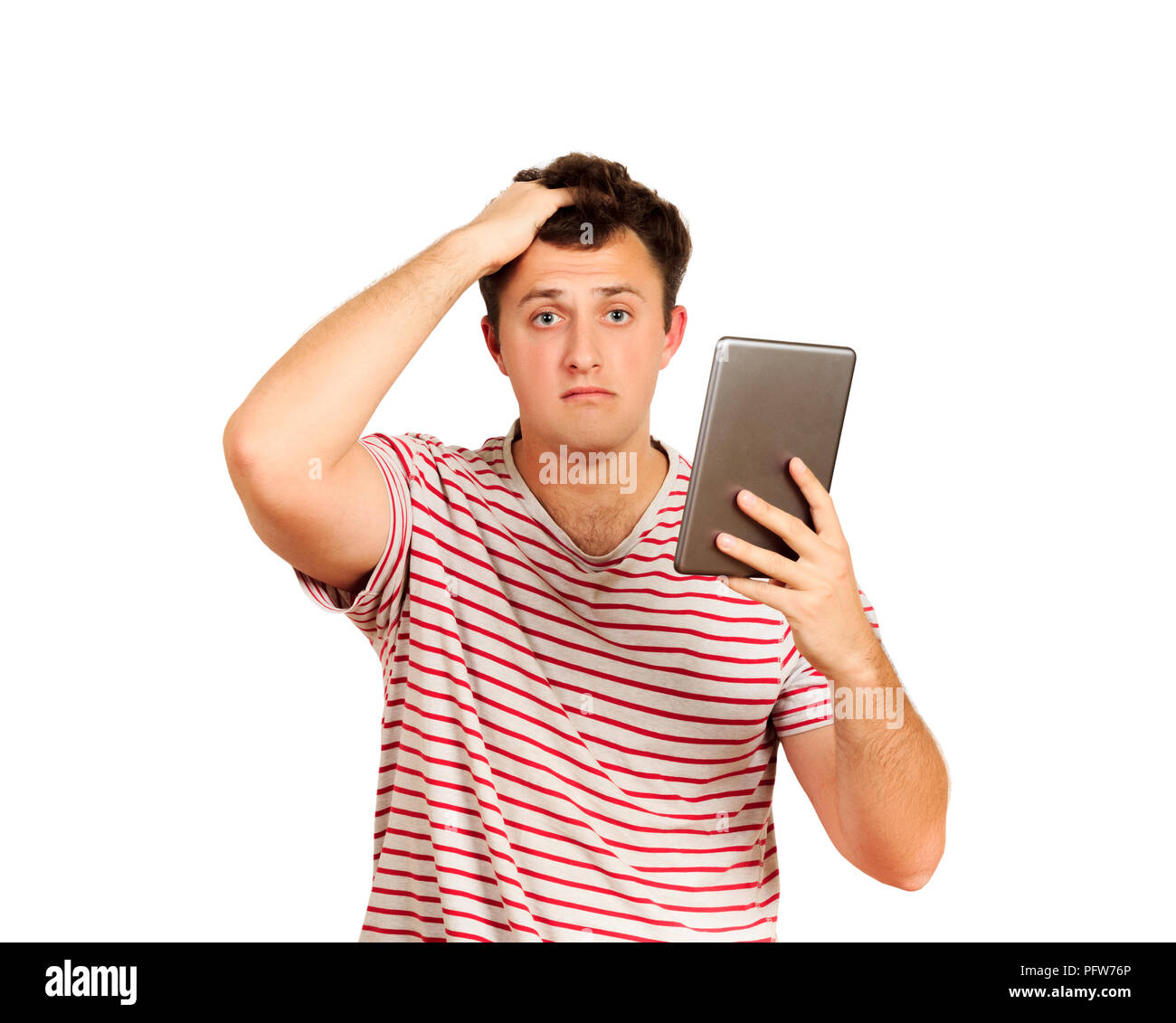 Man desk holding tablet watching hi-res stock photography and images ...