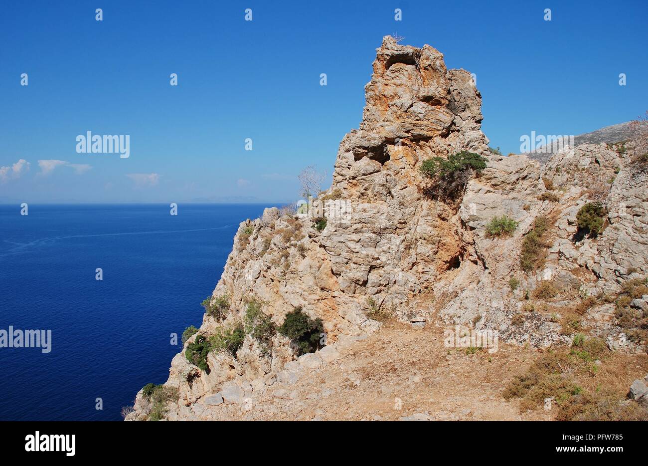 A rocky outcrop on the cliff top path from Livadia to Gera on the Greek ...