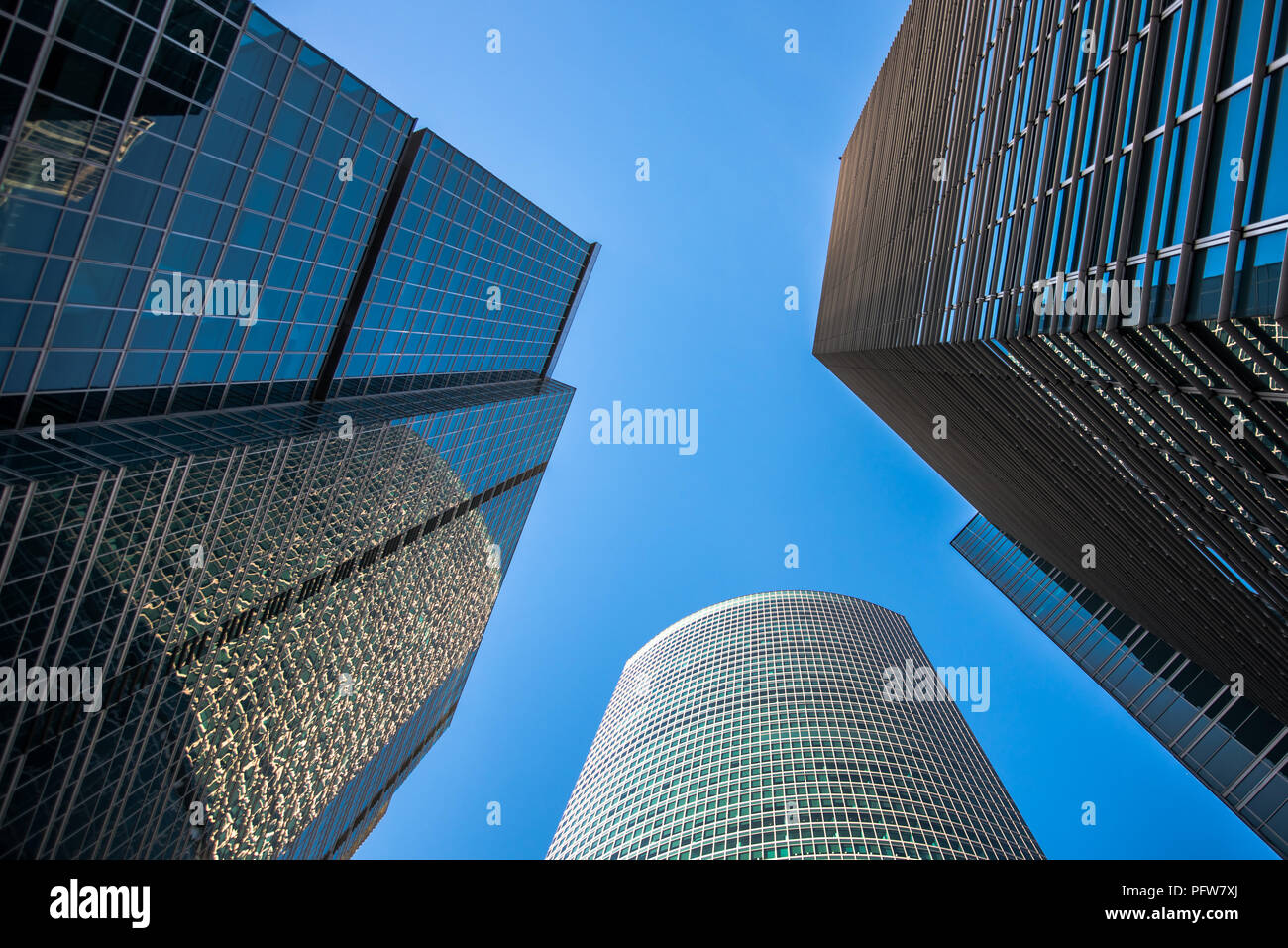 Perspective low angle view of modern glass skyscrapers facades Stock ...