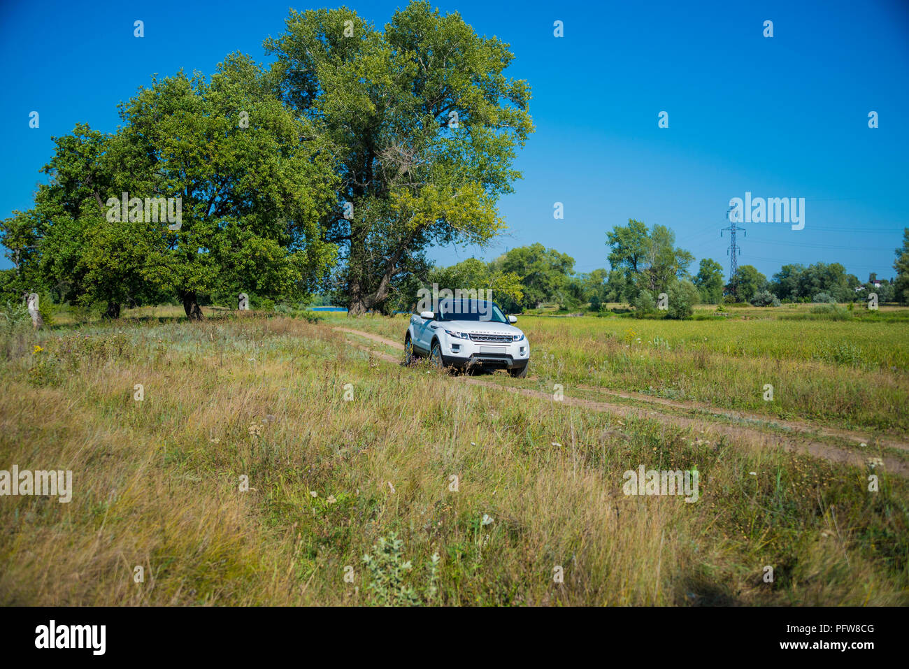 Car Land Rover Range Rover in summer Sunny weather in the summer ...