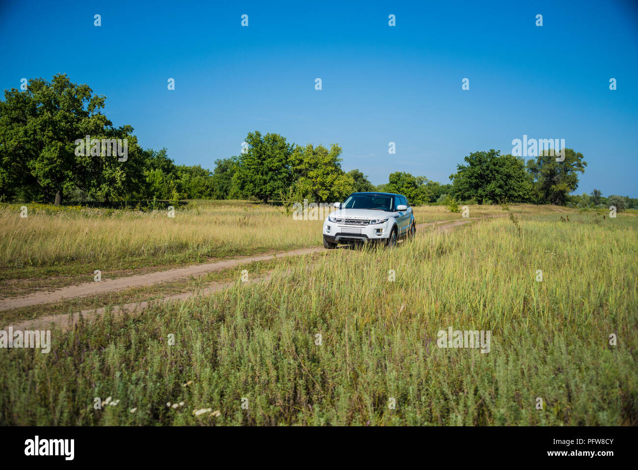 Car Land Rover Range Rover in summer Sunny weather in the summer ...