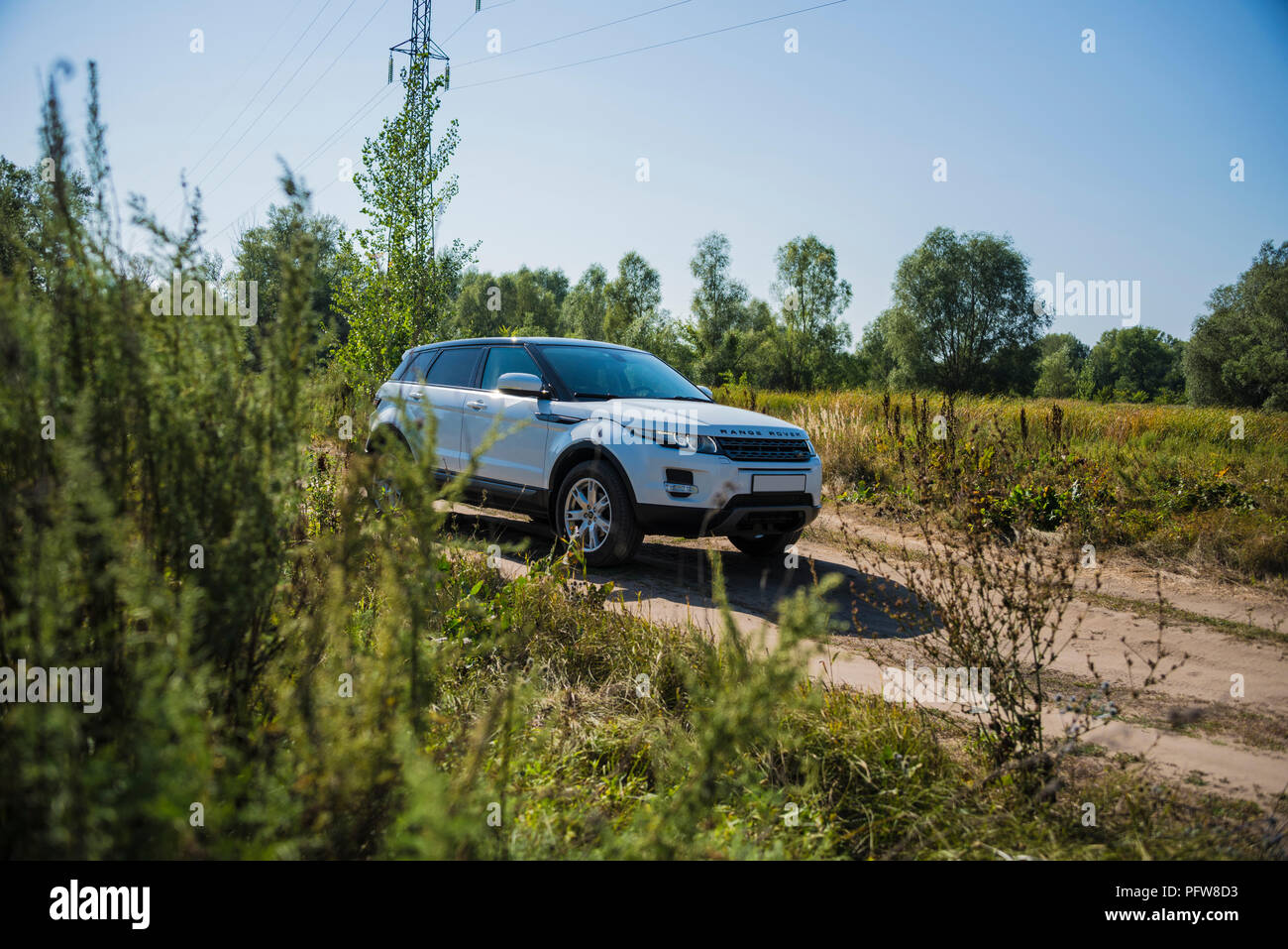 Car Land Rover Range Rover in summer Sunny weather in the summer ...