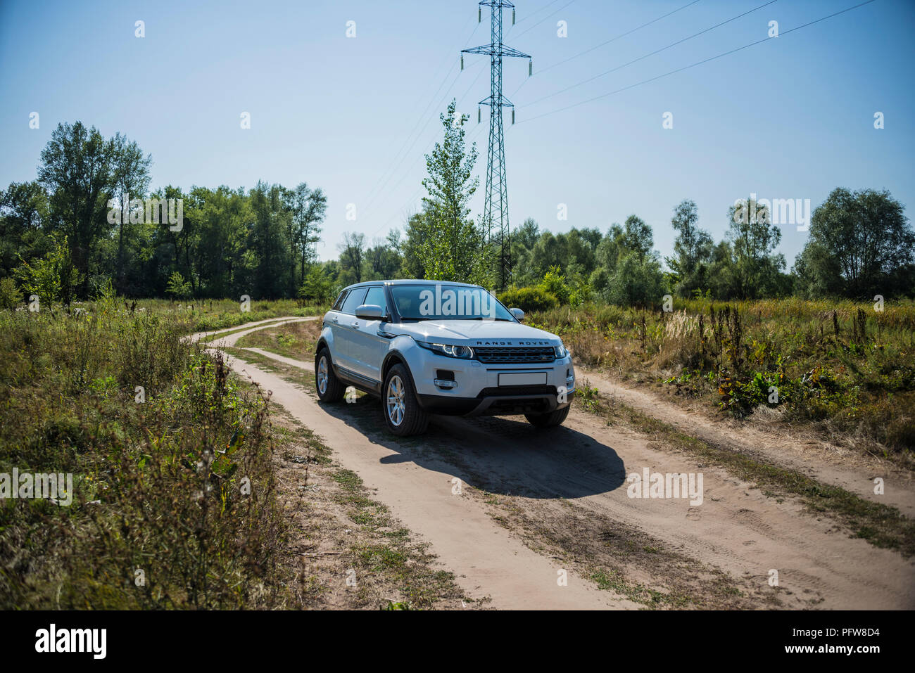 Car Land Rover Range Rover in summer Sunny weather in the summer ...