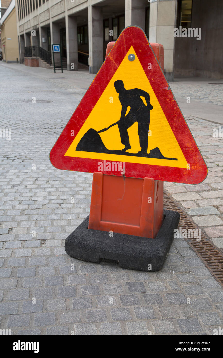 Road Works Sign in Urban Setting Stock Photo - Alamy