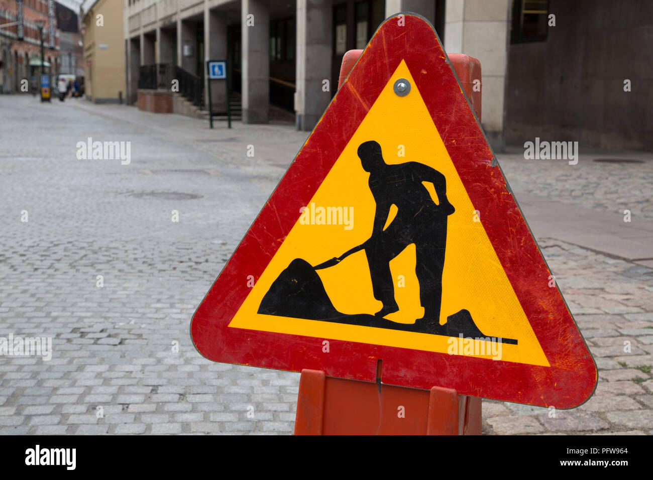 Road Works Sign in Urban Setting Stock Photo - Alamy