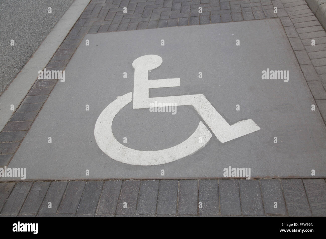 Disabled Parking Sign in Urban Setting Stock Photo - Alamy