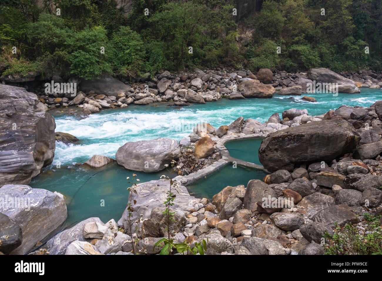 Natural hot spring in the Himalayas on a spring day, Nepal Stock Photo ...
