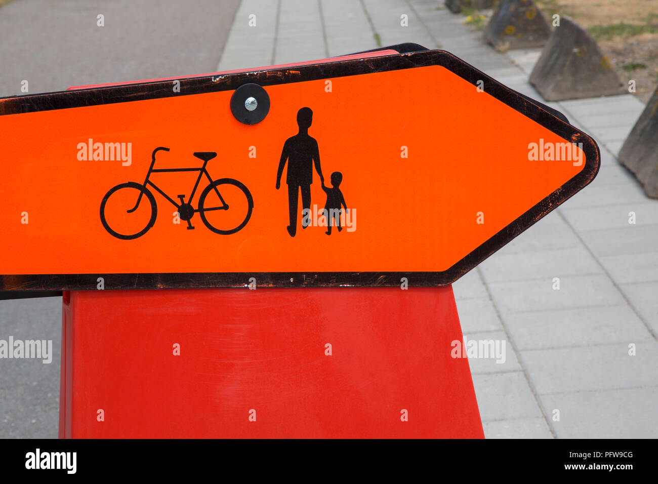 Orange Pedestrian and Cycling Sign Stock Photo - Alamy