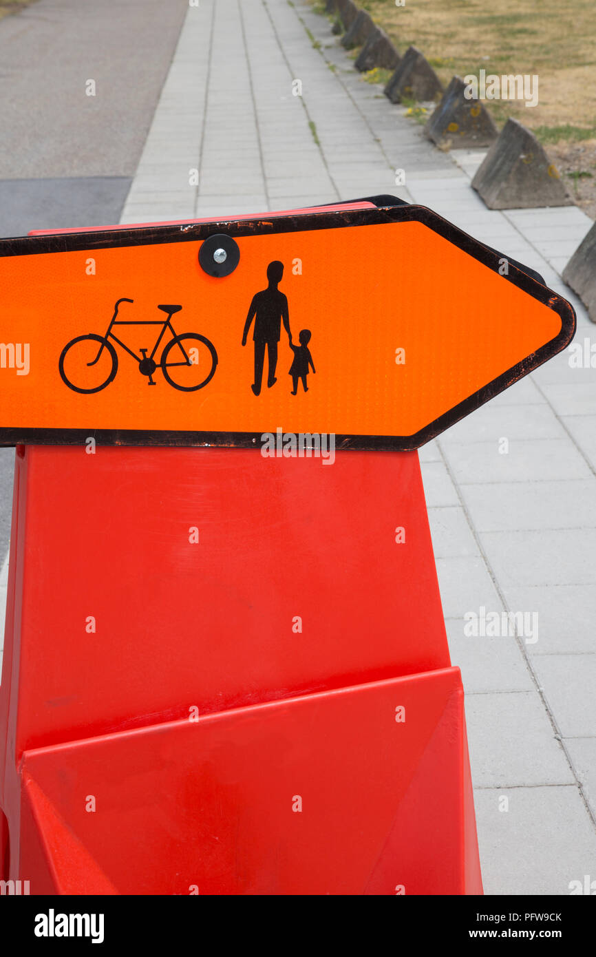 Orange Pedestrian and Cycling Sign Stock Photo - Alamy