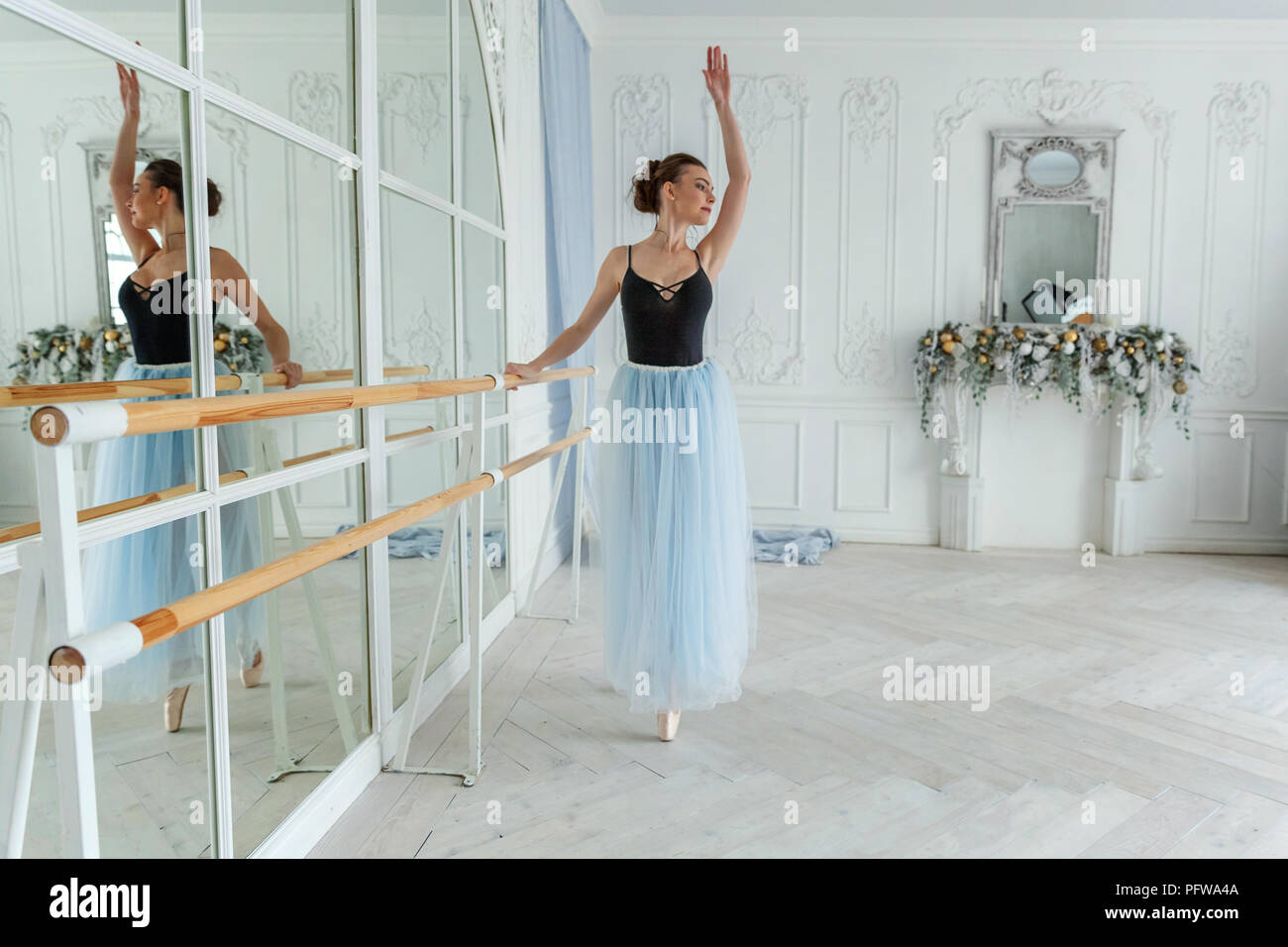 Young classical Ballet dancer side view. Beautiful graceful ballerine ...