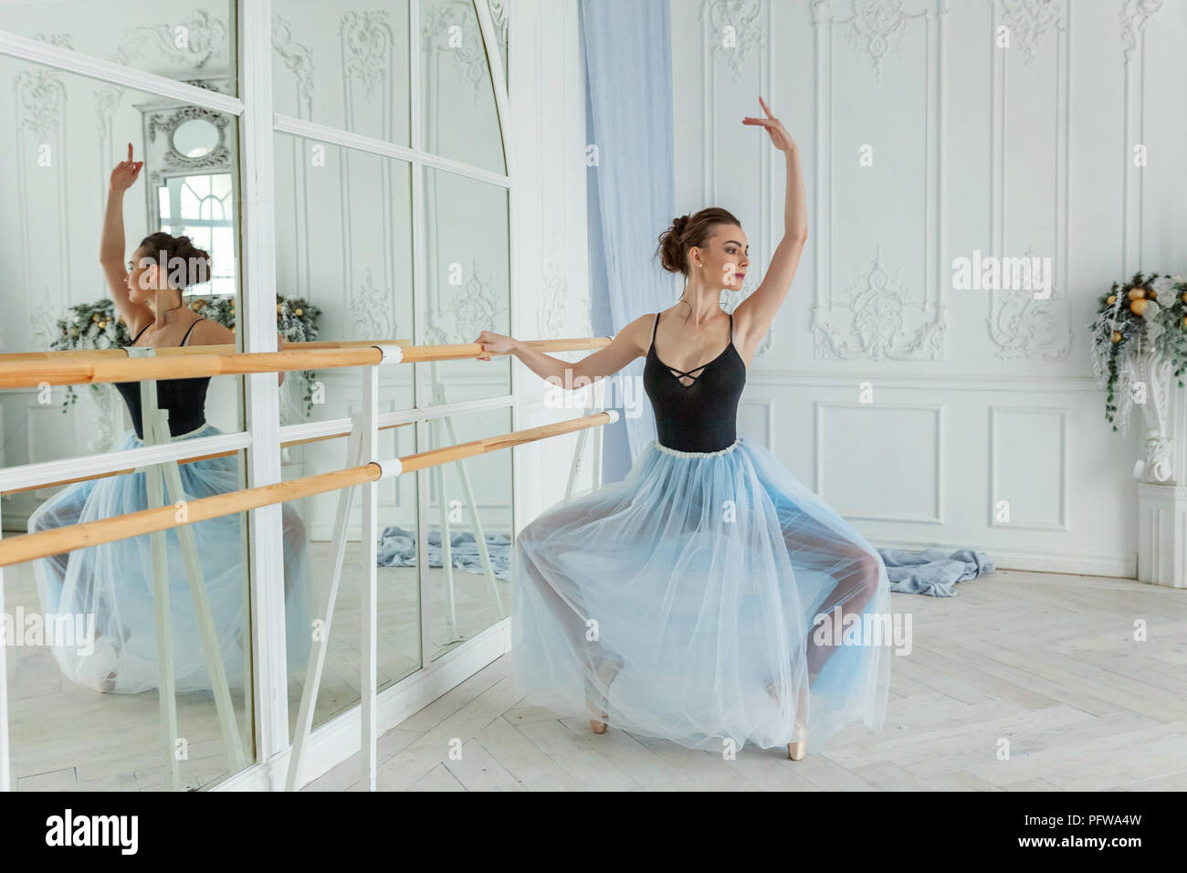 Young classical Ballet dancer side view. Beautiful graceful ballerine ...