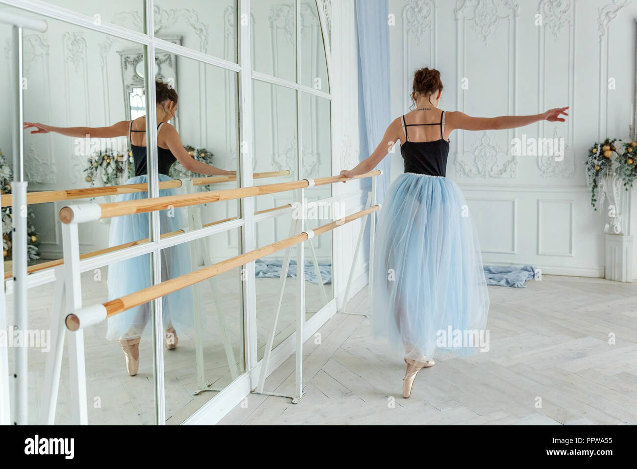 Young classical Ballet dancer side view. Beautiful graceful ballerine ...