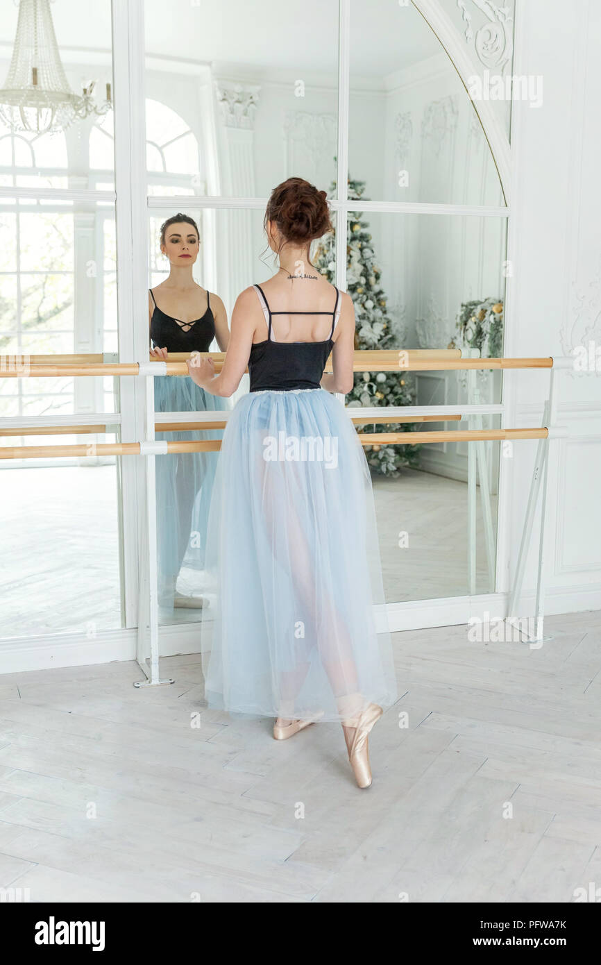 Young classical Ballet dancer side view. Beautiful graceful ballerine ...