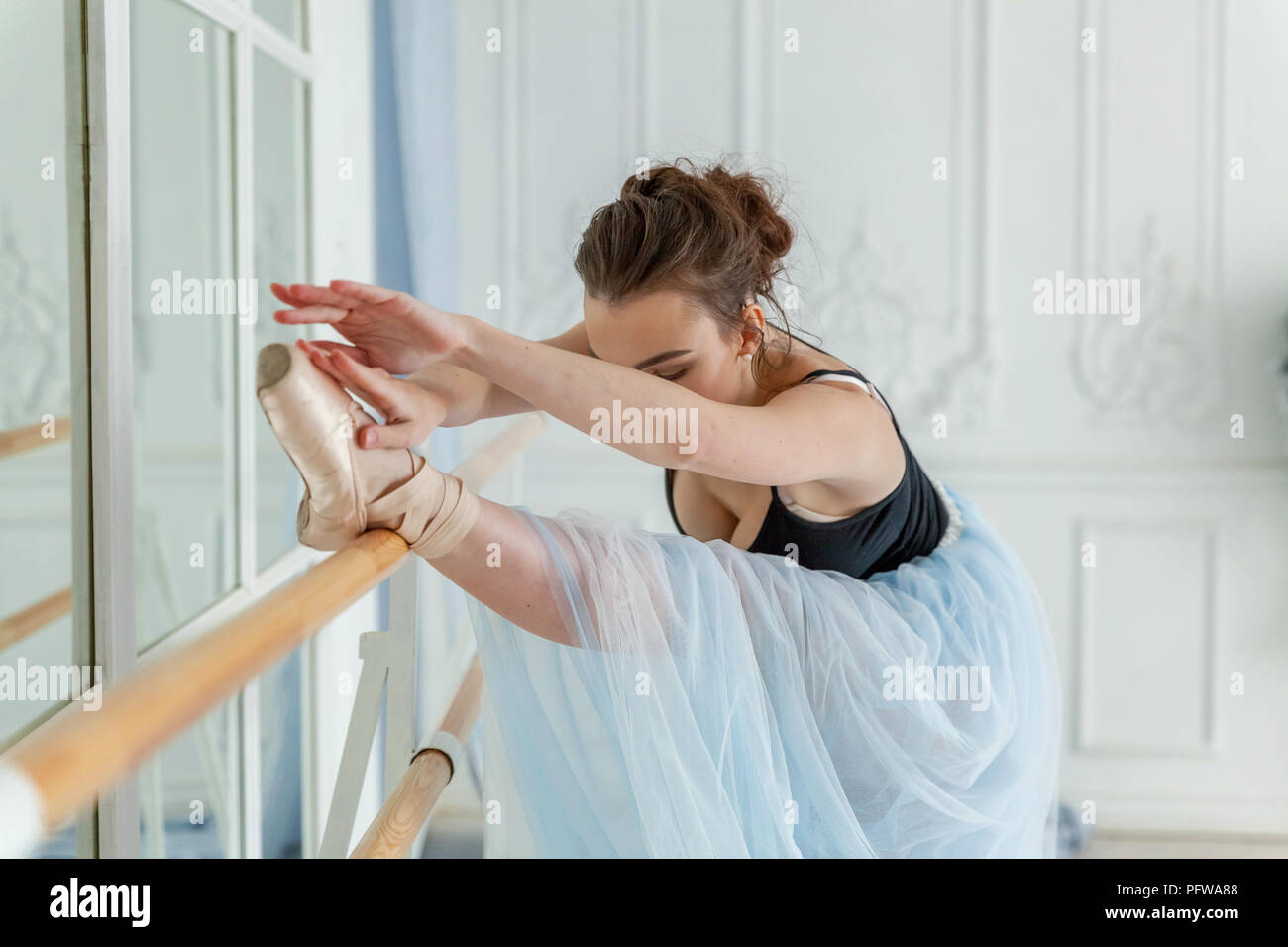 Young classical Ballet dancer side view. Beautiful graceful ballerine ...