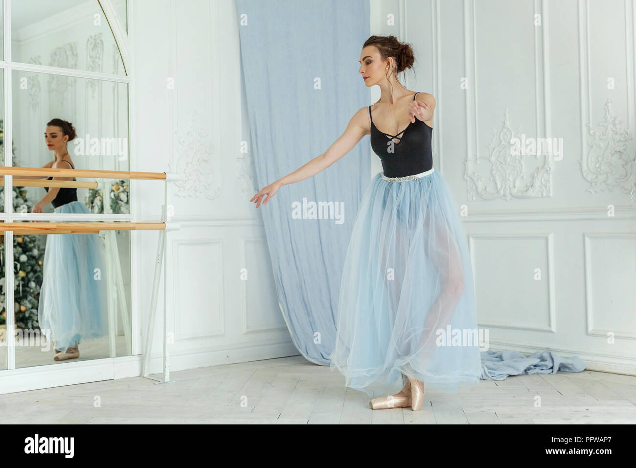 Young classical Ballet dancer side view. Beautiful graceful ballerine ...