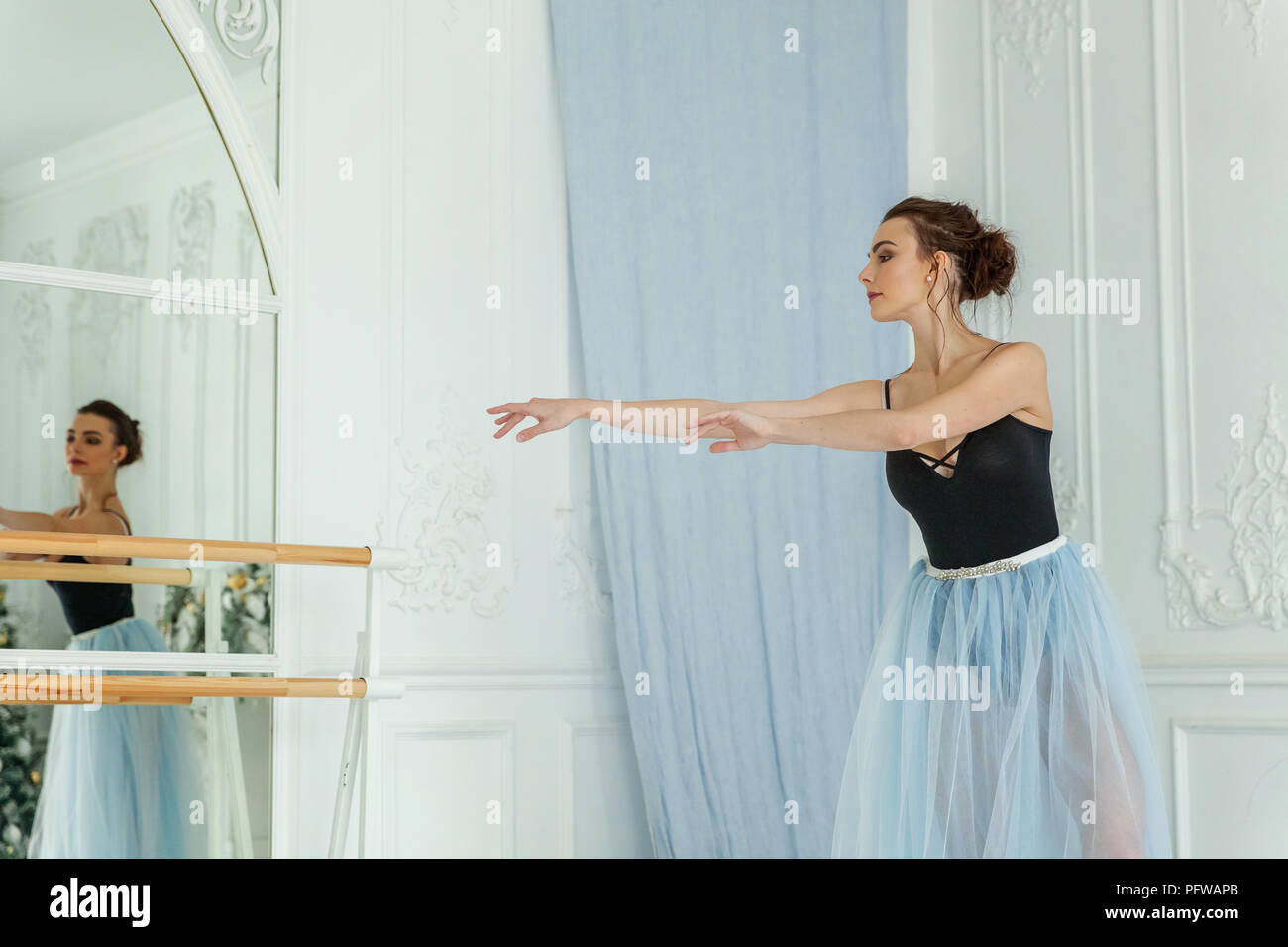 Young classical Ballet dancer side view. Beautiful graceful ballerine ...