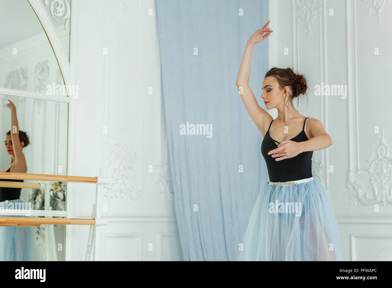 Young classical Ballet dancer side view. Beautiful graceful ballerine ...